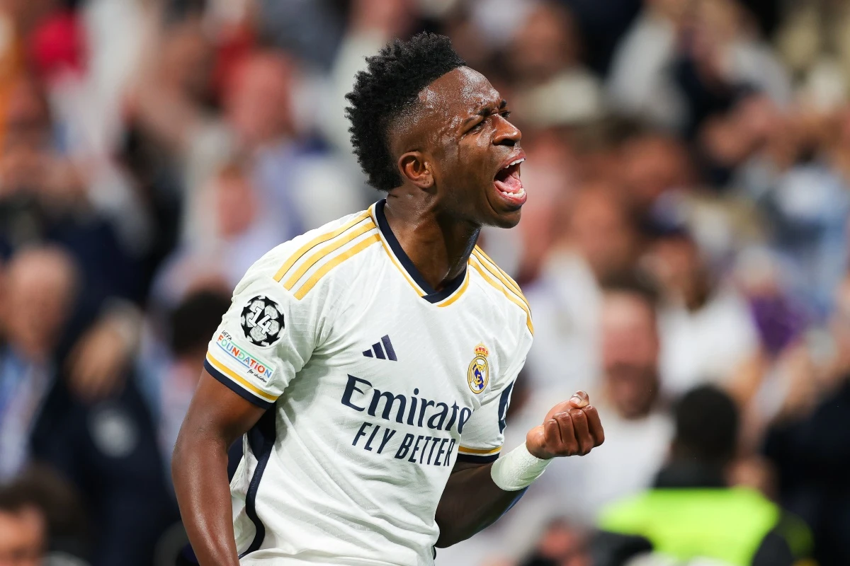 Vini Jr. empata com Messi em assistências na Champions